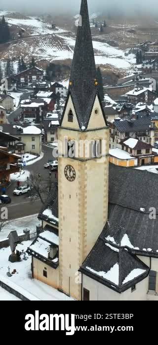 Arabba, Italy - January 8, 2025: Aerial drone view of thecburch in the ...
