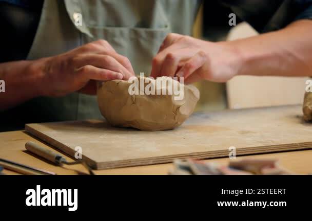 Caucasian man guy male hands modeling clay handmade process sculpting ...