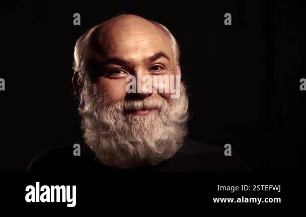 Close-up of a senior mans face. Emotional elderly grandfather portrait ...