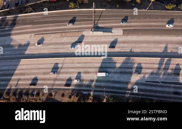 A captivating aerial shot taken from above reveals a busy highway ...
