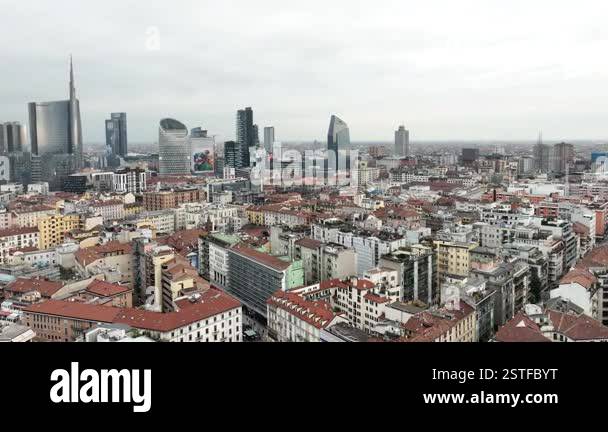 Editorial aerial footage of Milans skyline, Italy, filmed on February 3 ...