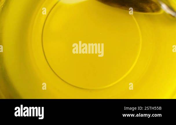 Unrefined extra virgin olive oil texture top view slow motion Stock ...