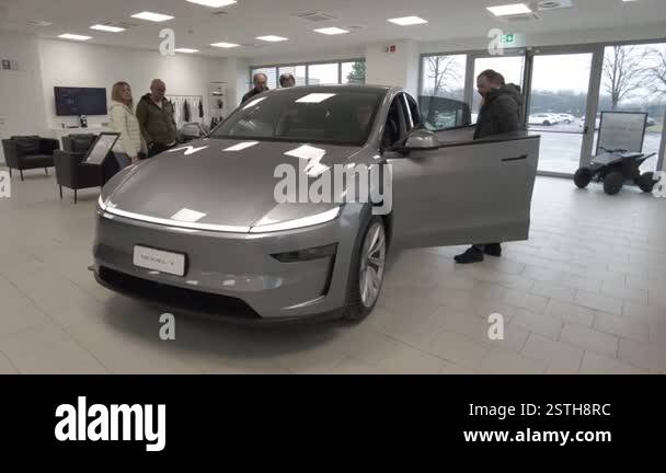 Europe, Italy, Milan 02,11,2025 Tesla car showroom presents the new ...