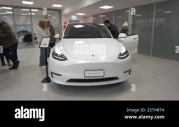 Europe, Italy, Milan 02,11,2025 Tesla car showroom presents the new ...