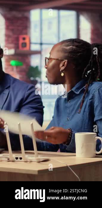 Angry African American people tries to reset the Wi Fi modem due to ...