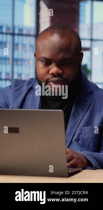 Woman Completing Spreadsheets On Notebook Entering Numerical Data Into Cells Calculating