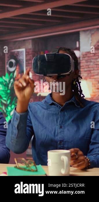 Black people integrate VR and AI into their daily job routine where the man engages in immersive ...