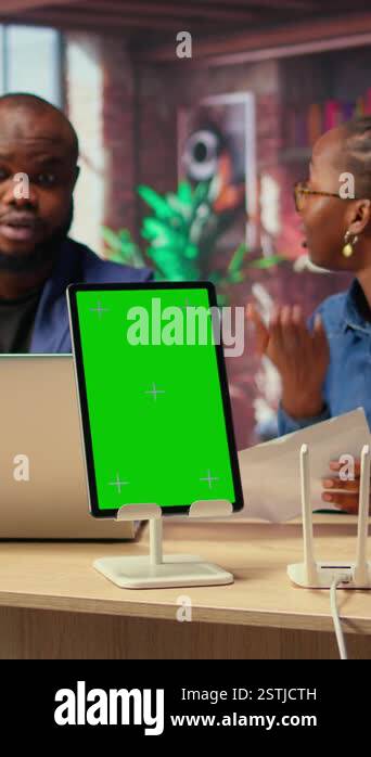 Black man and woman getting angry at home internet next to mockup ...