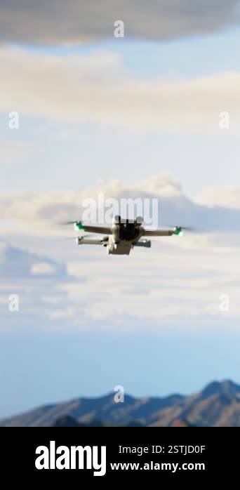 Vertical Video Modern traveler creating content and filming the valley ...