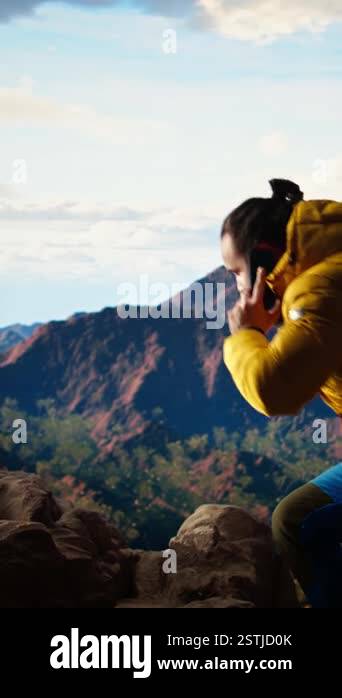 Vertical Video Clumsy foolish hiker dropping his phone in search of ...