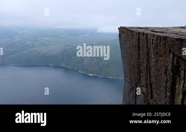 Gaze upon breathtaking vistas as the rugged cliffs of Preikestolen ...