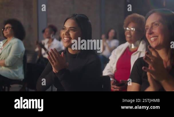 Group of people clapping hands with joyful expressions in worship ...
