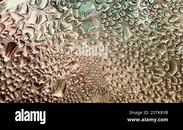 Close-up of water drops on metal surface in high resolution showing ...