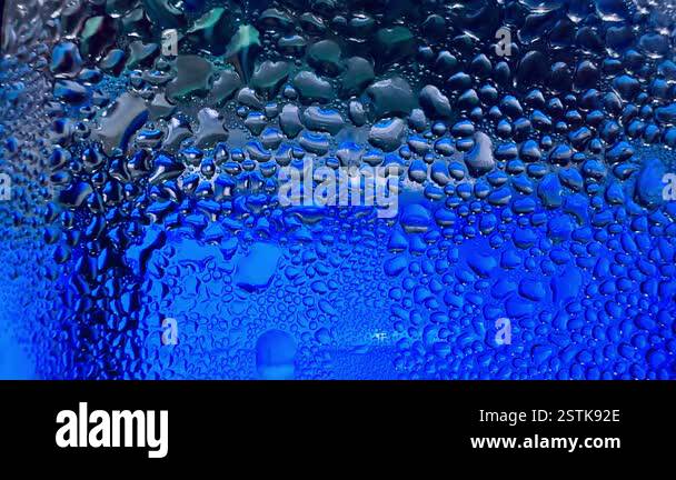Close-up of water drops on metal surface in high resolution showing ...