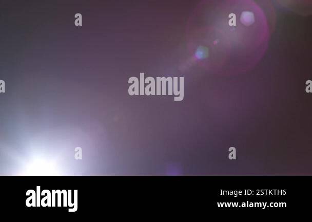 Loop white pink optical lens flares shine rays light move from bottom ...