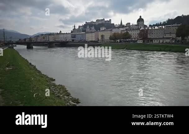 Salzburg, Austria. Walking along the river, clear sunset sky. High ...