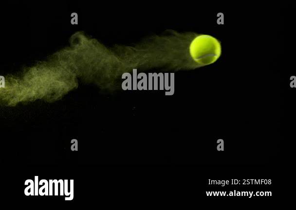 Super Slow Motion Detail Shot of Flying and Rotating Tennis Ball and ...