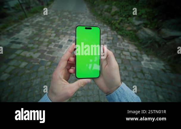 Shooting of male hands with smartphone. View of Caucasian young man ...