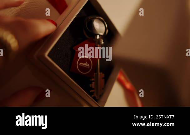 Closeup of hands gently and carefully placing a modern device on a ...