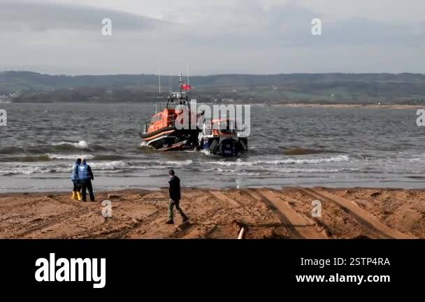 Exmouth, UK. 02-15-24. RNLI lifeboat returning to the sea, the ...