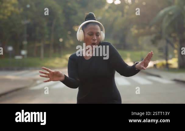 Joyful Lovely Woman Funny Dancing with Headphones Doing Crazy Moves ...