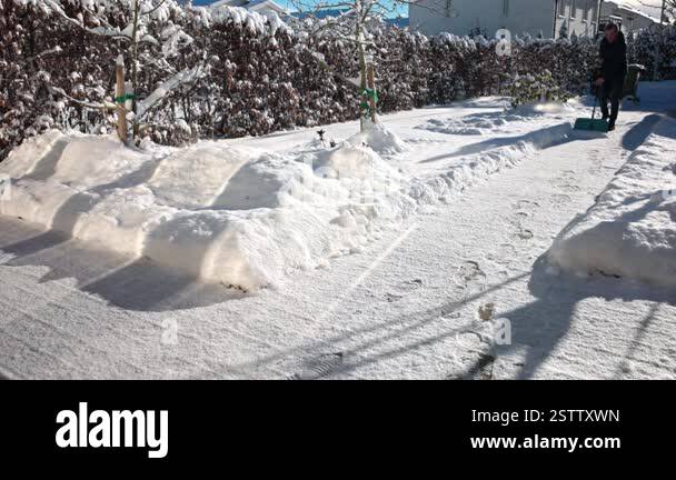 Clearing the pathway of snow Stock Videos & Footage - HD and 4K Video ...