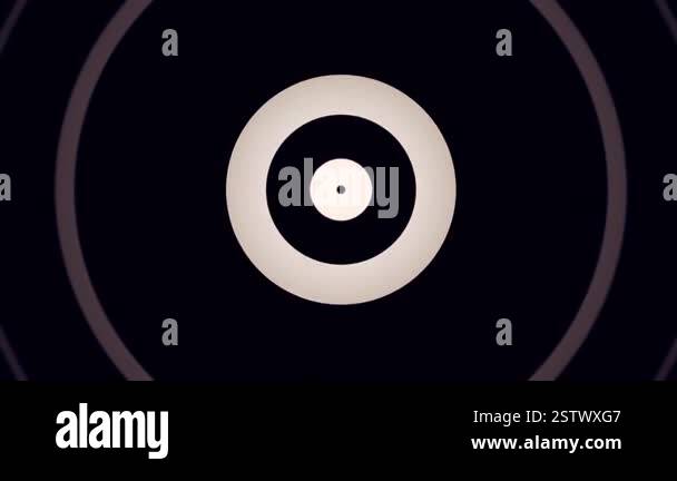 Optical art monochromatic 4k animation of concentric white circles ...