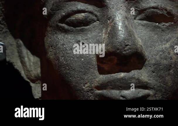 Close-up view of detailed ancient Egyptian sarcophagus head, showcasing ...