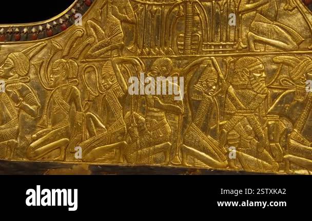 Detailed macro view of Tutankhamun parade chariot. Gilded surfaces ...