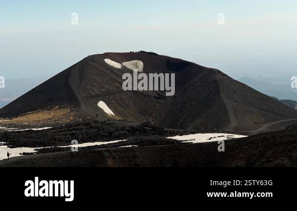 Wonderful timelapse of hikers on Etna volcano. Tourists walk along the ...