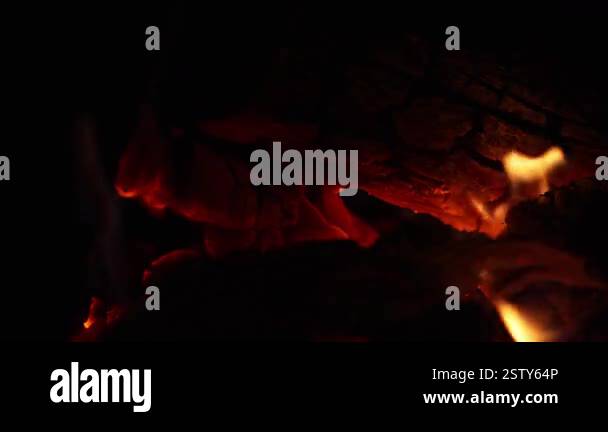 Burning wood, Flames, Bonfire, fire in the dark. Hell, heat and burning ...