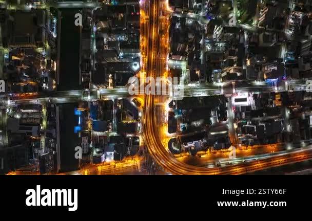 Birds eye shot of transport infrastructure in metropolis. Fly above ...