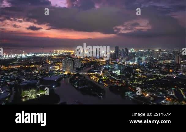 Amazing aerial panoramic hyperlapse shot of large city at dusk ...