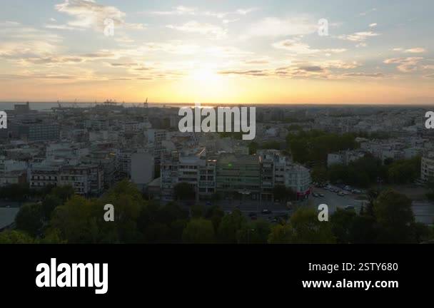 Thessaloniki, Greece, presents a lively cityscape at golden hour ...
