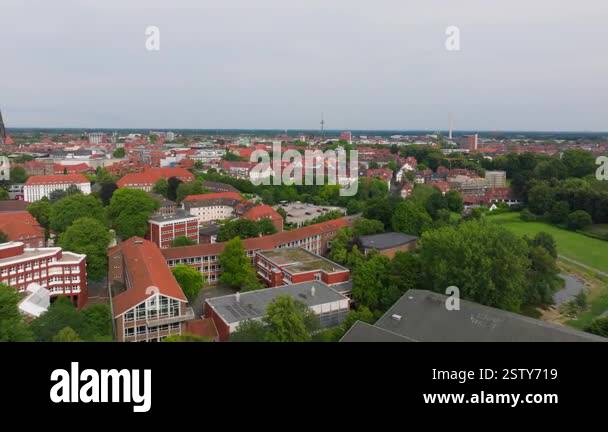 Aerial views showcase the city of Munster, germany, featuring red ...