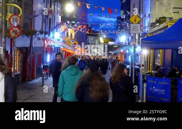 Galway Ireland The Latin Quarter - As night falls, people stroll ...