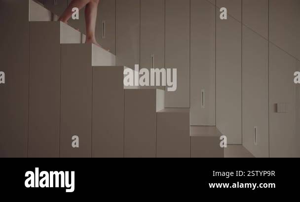 A creative image capturing a person expertly balancing on cubical ...