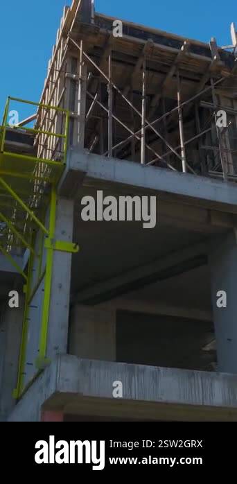 Metal framework installation supervised by engineers. Aerial footage of ...