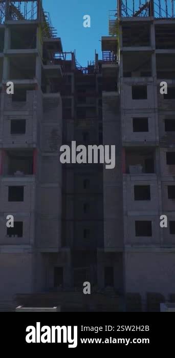 Vertical Video of Residential Construction With Workers Installing ...