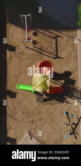 Playground with swings and slides. Aerial footage of a fun and vibrant ...