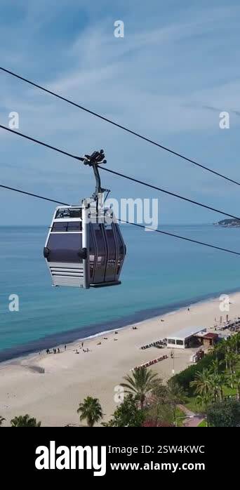 Funicular with coastal backdrop. Vertical footage of an elegant aerial ...