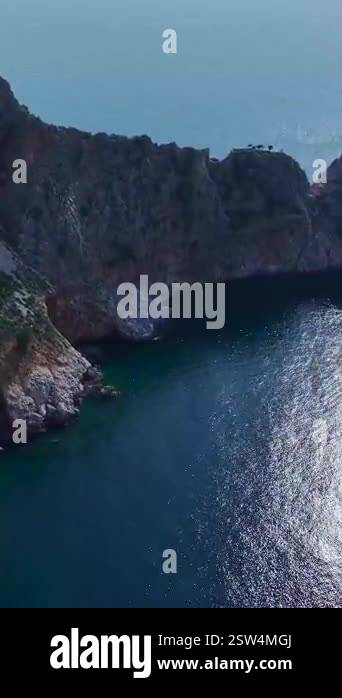 Cliff and ocean view. Vertical footage of a scenic natural wonder Stock ...