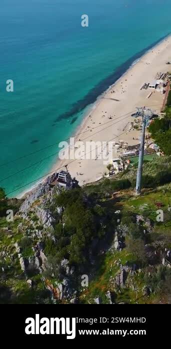 Funicular with coastal backdrop. Vertical footage of an elegant aerial ...