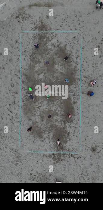 Aerial volleyball action. Vertical footage of an intense game on the ...