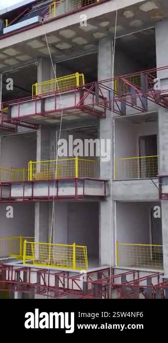 Construction skeleton. Vertical footage of an evolving urban ...
