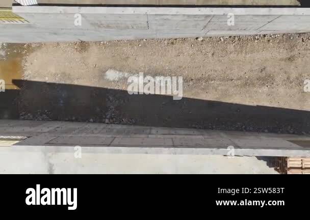 Watch workers at a construction site, showing their skills and making ...