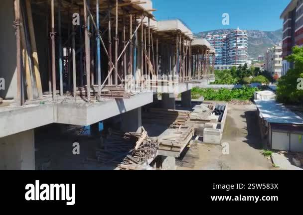 Workers on the construction site use their skills to move the project forward with precision ...