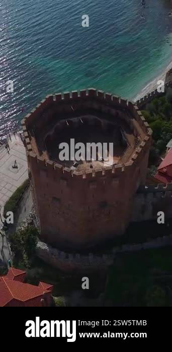Aerial shadow play on Red Tower. Vertical footage of an architectural ...
