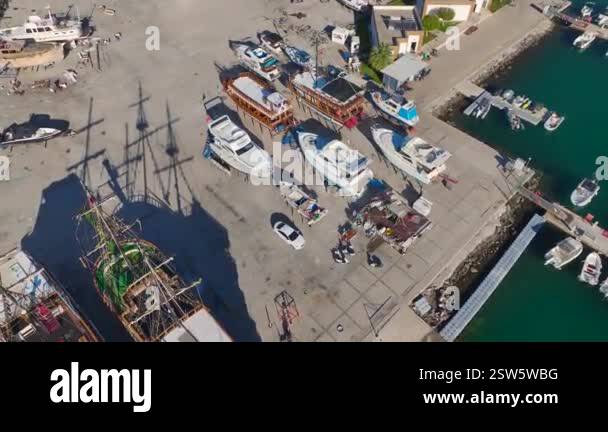 Busy repair activity in a dry dock Stock Video Footage - Alamy