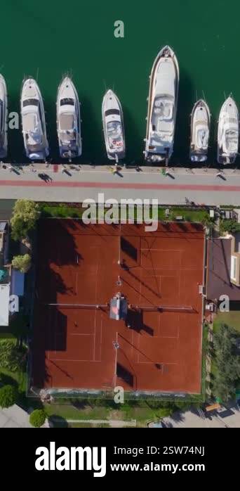 Clay court and blue waters. Aerial footage of a vibrant and unique ...